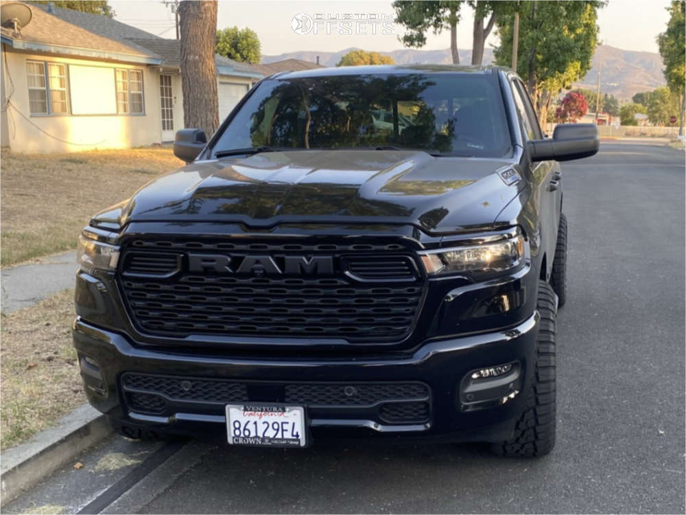 2025 Ram 1500 with 18x9 -12 Vision Rocker and 33/12.5R18 RBP Repulsor ...