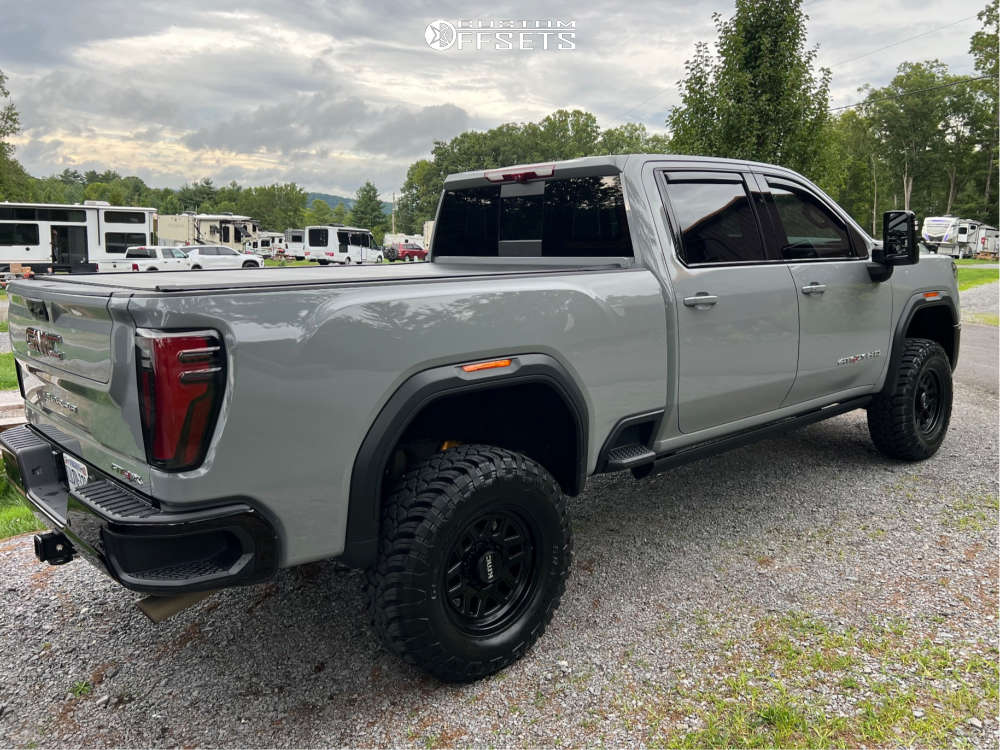 2024 GMC Sierra 2500 HD with 18x9 0 KMC Km451 and 35/12.5R18 General ...