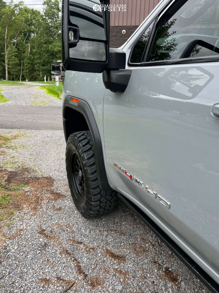 2024 GMC Sierra 2500 HD with 18x9 0 KMC Km451 and 35/12.5R18 General ...