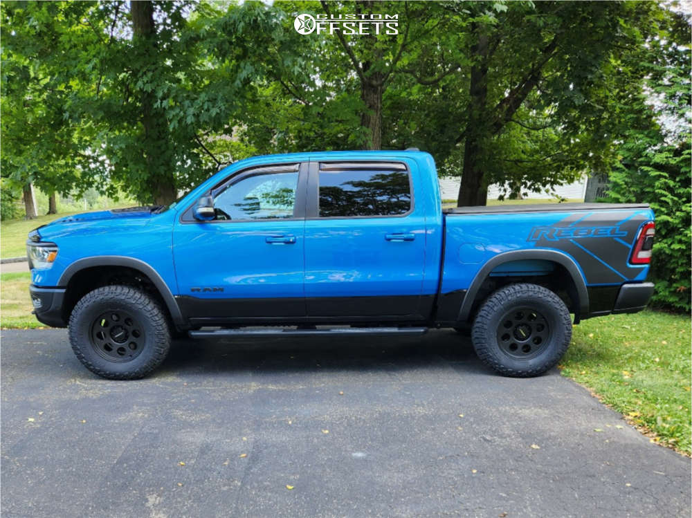 2020 Ram 1500 with 18x9 -12 Vision Midway and 35/12.5R18 Cooper ...