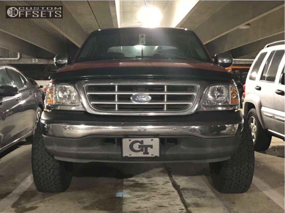 2002 Ford F-150 with 16x8.5 -25 Level 8 Tracker and 305/70R16 ...