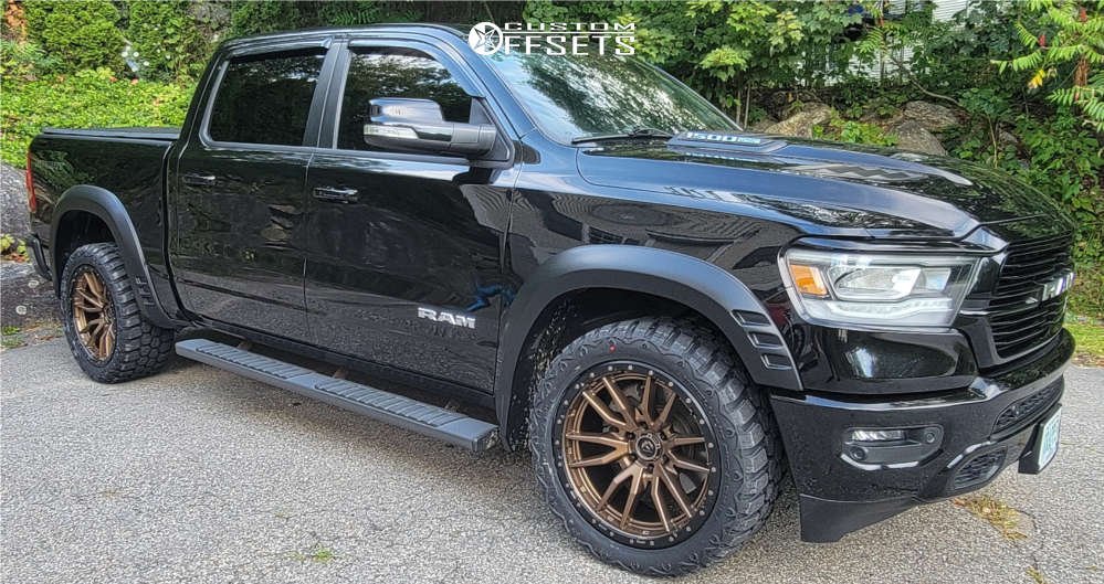 2022 Ram 1500 with 22x10 -13 Fuel Rebel 6 and 33/12.5R22 RBP Repulsor ...