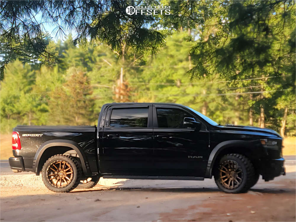 2022 Ram 1500 with 22x10 -13 Fuel Rebel 6 and 33/12.5R22 RBP Repulsor ...