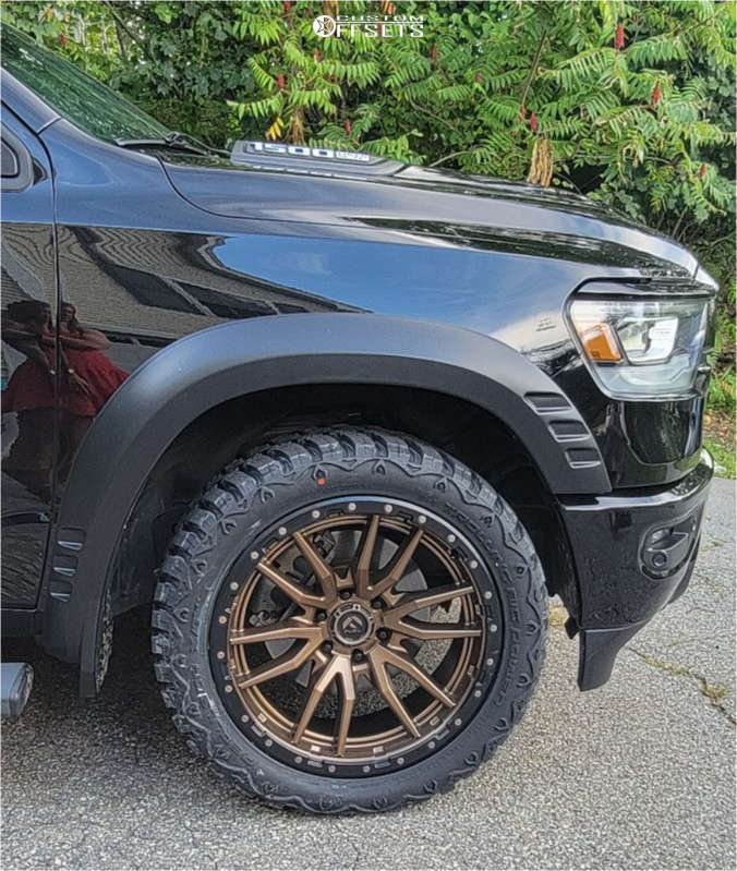 2022 Ram 1500 with 22x10 -13 Fuel Rebel 6 and 33/12.5R22 RBP Repulsor ...