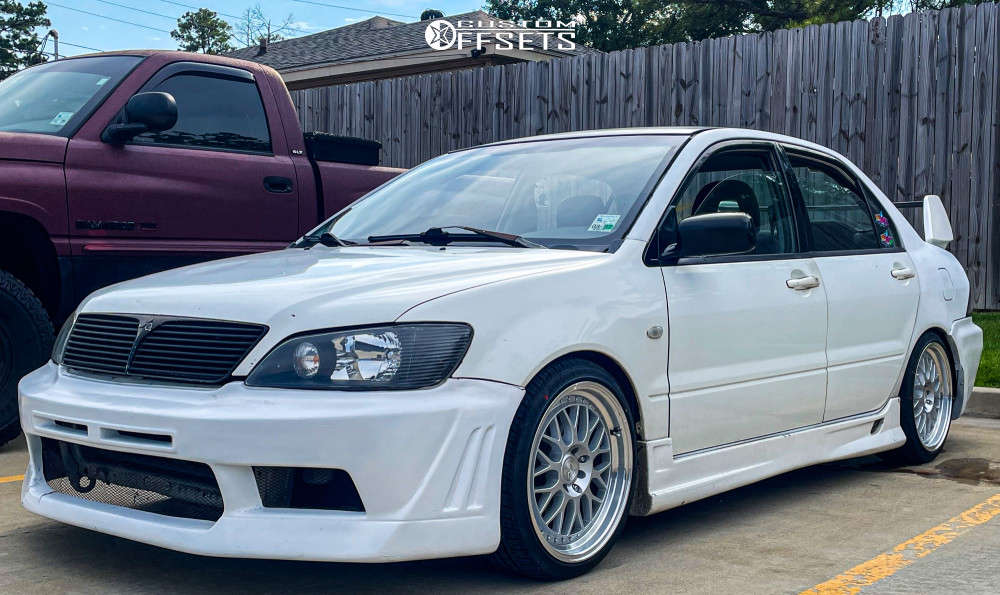 2002 Mitsubishi Lancer with 17x8 35 Aodhan Ah02 and 205/40R17 Road One ...
