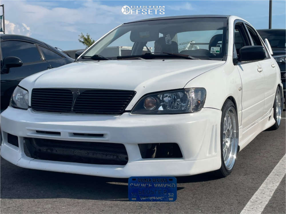 2002 Mitsubishi Lancer with 17x8 35 Aodhan Ah02 and 205/40R17 Road One ...