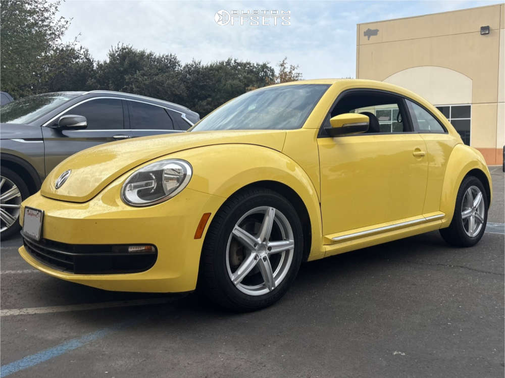 2016 Volkswagen Beetle with 17x7 38 Vision Boost and 225/55R17 Goodyear ...