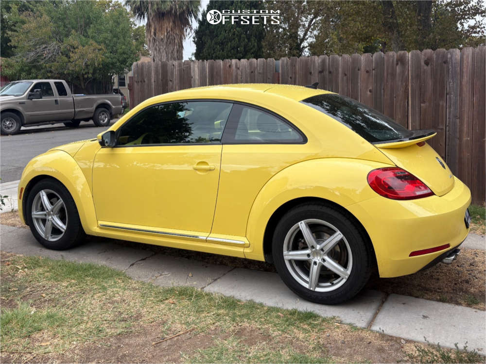 2016 Volkswagen Beetle with 17x7 38 Vision Boost and 225/55R17 Goodyear ...