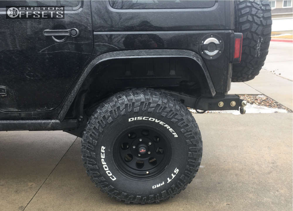 2014 Jeep Wrangler with 15x8 -19.05 Level 8 Tracker and 35/12.5R15 ...