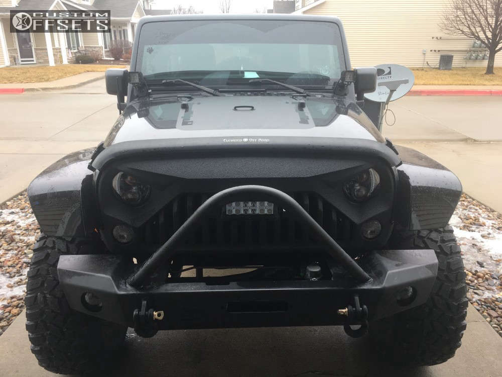 2014 Jeep Wrangler with 15x8 -19.05 Level 8 Tracker and 35/12.5R15 ...