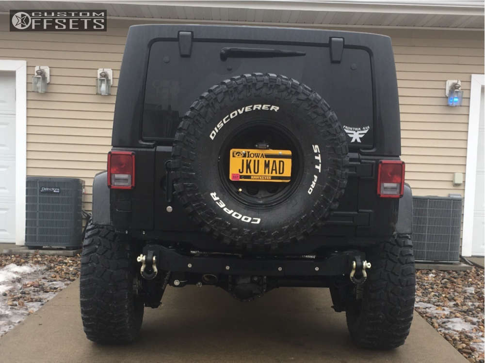 2014 Jeep Wrangler with 15x8 -19.05 Level 8 Tracker and 35/12.5R15 ...