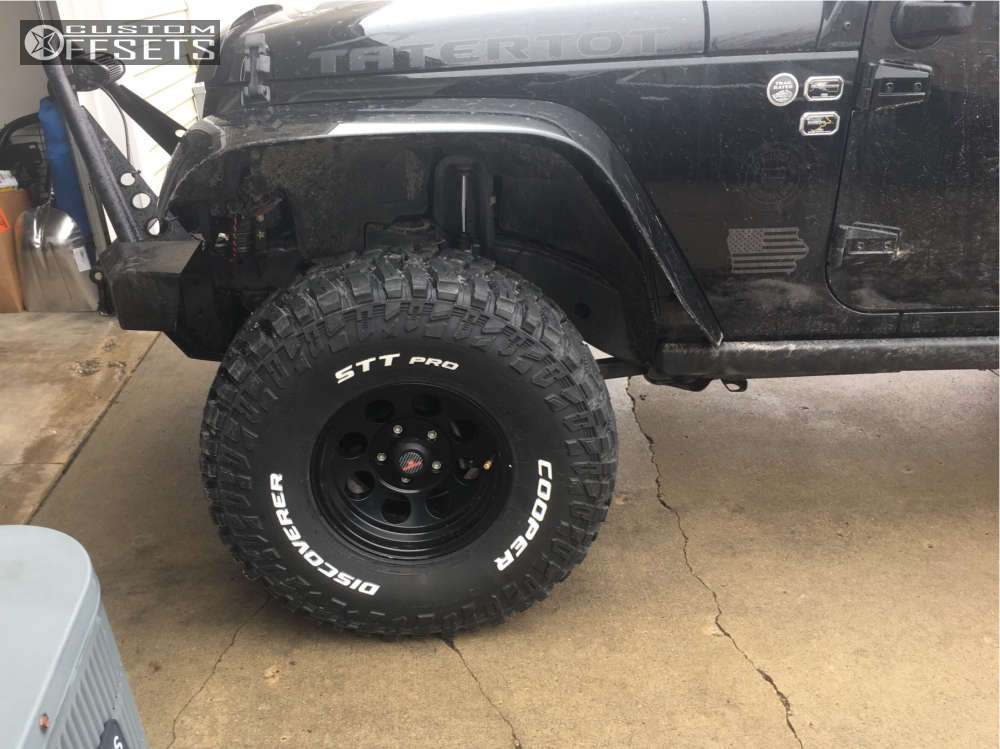 2014 Jeep Wrangler with 15x8 -19.05 Level 8 Tracker and 35/12.5R15 ...