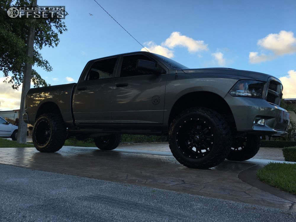 2012 Ram 1500 with 20x12 -44 TIS 535B and 35/12.5R20 Federal Couragia ...