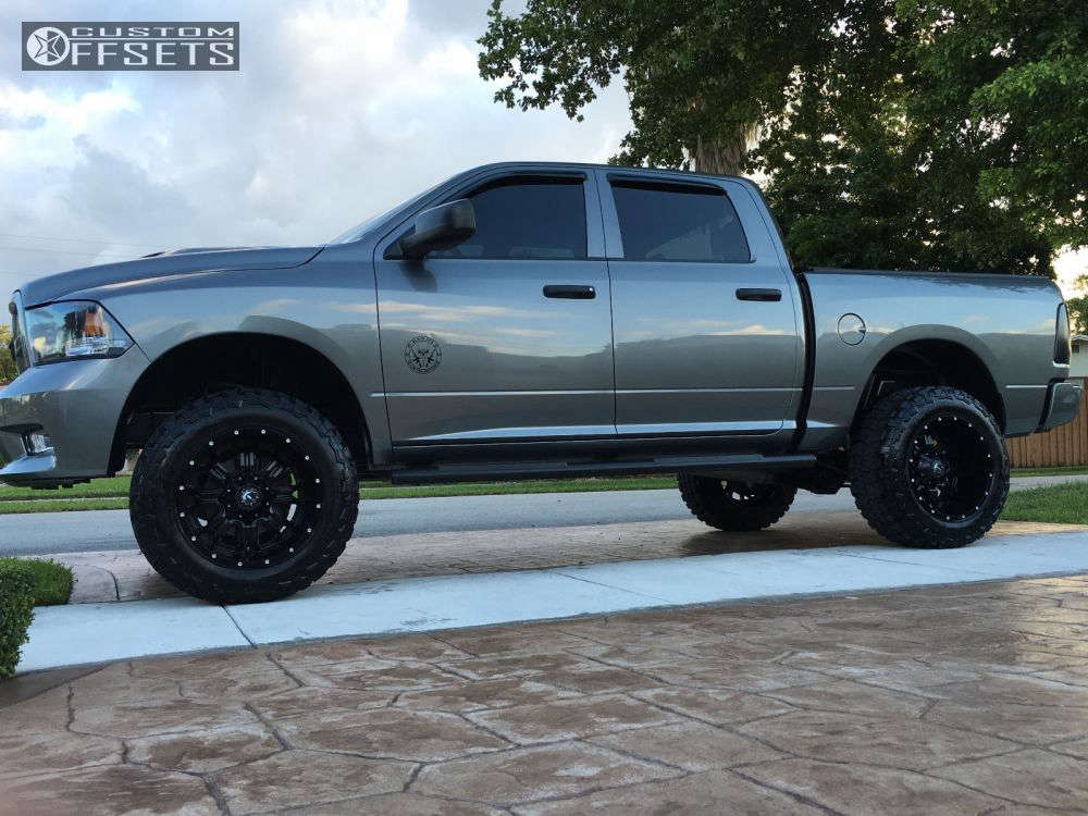 2012 Ram 1500 with 20x12 -44 TIS 535B and 35/12.5R20 Federal Couragia ...