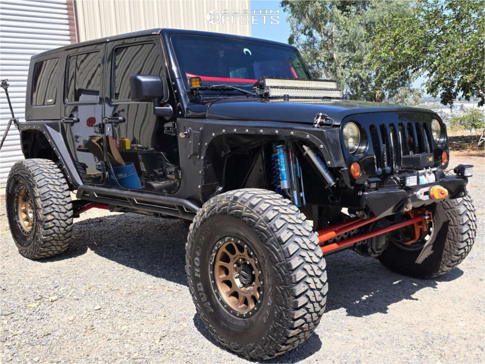 2012 Jeep Wrangler with 17x8.5 0 Method MR305 and 40/13.5R17 Kanati Mud ...