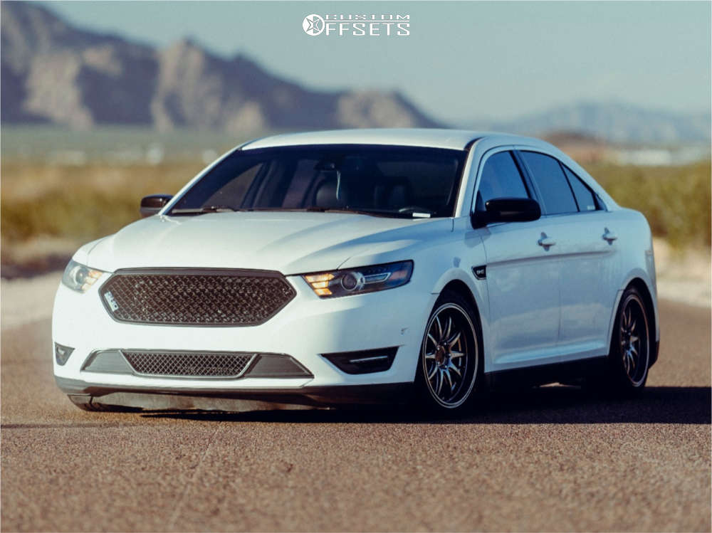 2014 Ford Taurus with 18x9 35 XXR 527d and 245/40R18 Falken Azenis ...