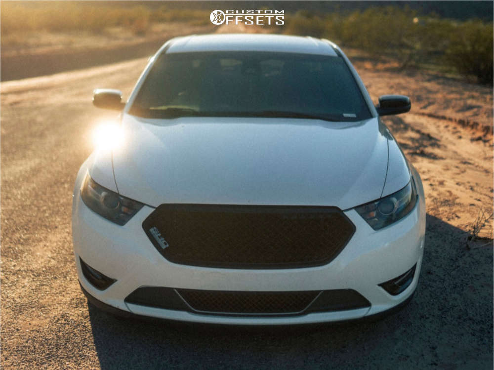 2014 Ford Taurus with 18x9 35 XXR 527d and 245/40R18 Falken Azenis ...