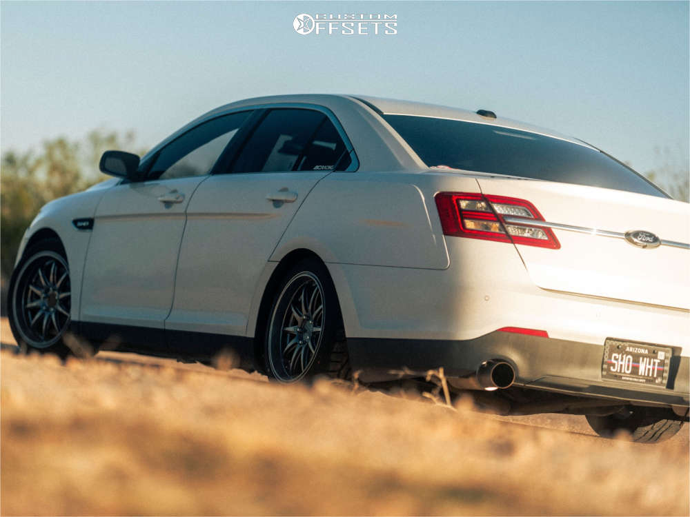 2014 Ford Taurus with 18x9 35 XXR 527d and 245/40R18 Falken Azenis ...