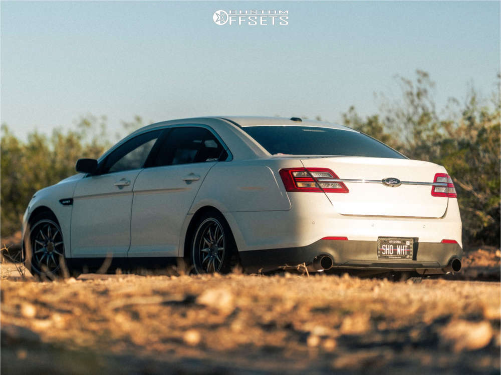 2014 Ford Taurus with 18x9 35 XXR 527d and 245/40R18 Falken Azenis ...