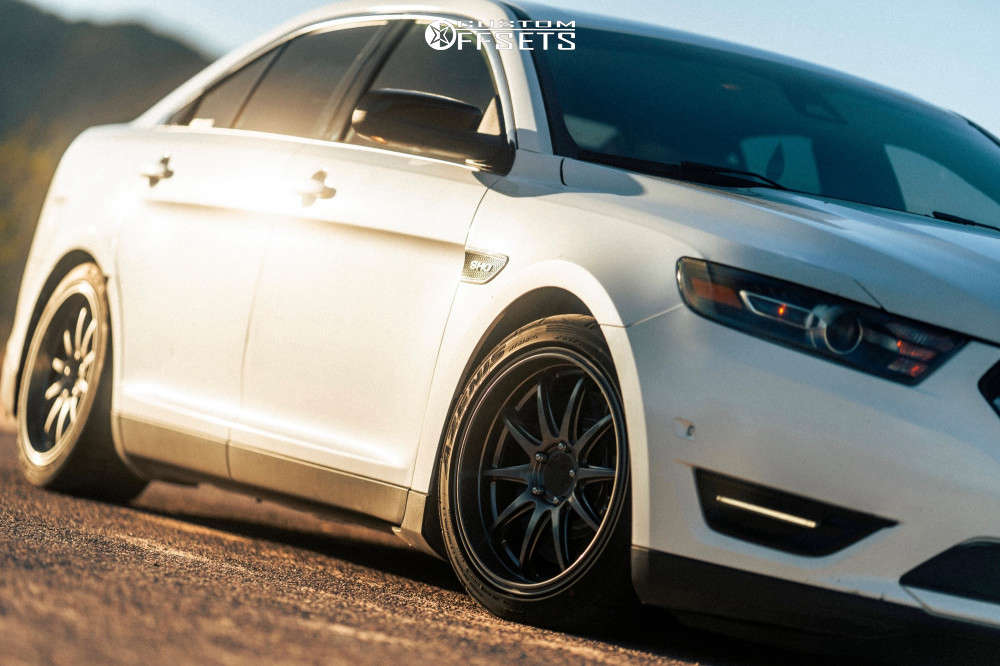 2014 Ford Taurus with 18x9 35 XXR 527d and 245/40R18 Falken Azenis ...