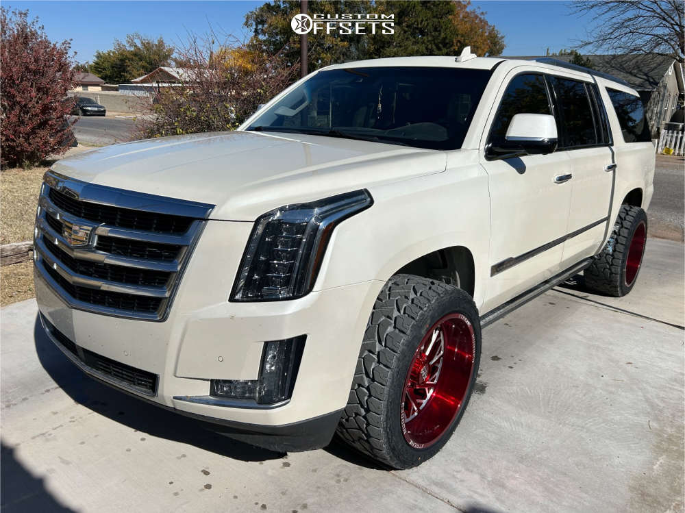 2015 Cadillac Escalade ESV with 22x12 -44 Xtreme Mudder Xm-400 and 33/ ...