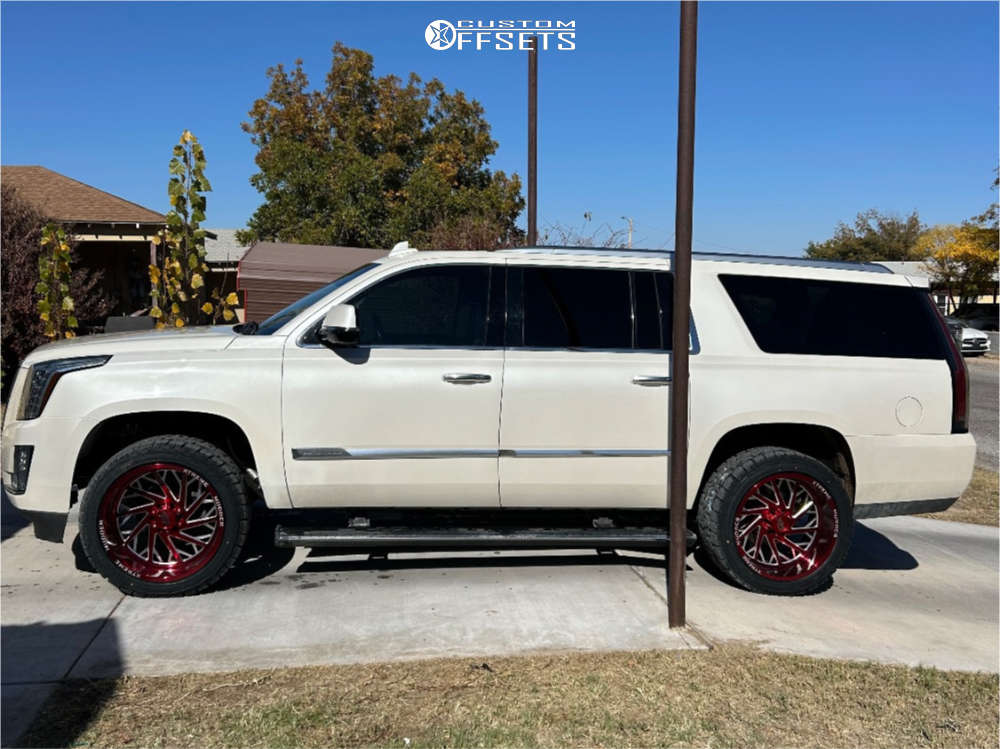 2015 Cadillac Escalade ESV with 22x12 -44 Xtreme Mudder Xm-400 and 33/ ...