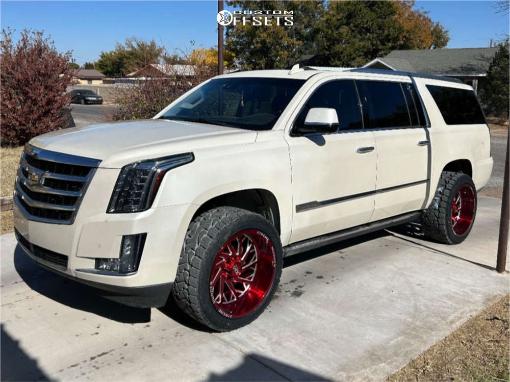 2015 Cadillac Escalade ESV with 22x12 -44 Xtreme Mudder Xm-400 and 33/ ...