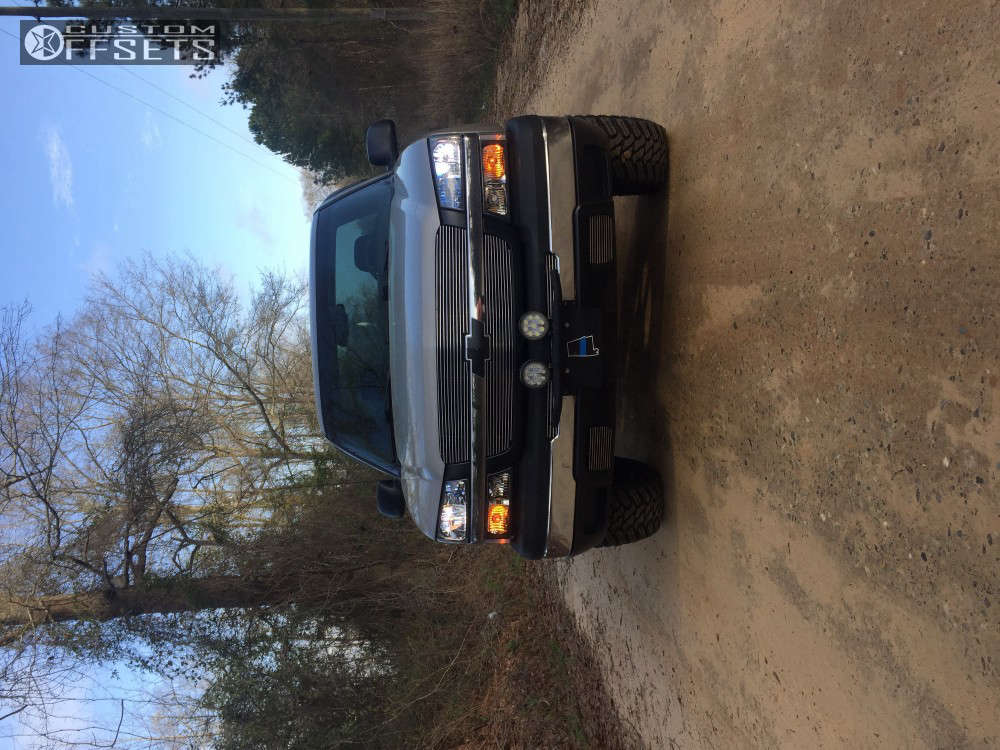 2004 Chevrolet Silverado 1500 with 20x9 Mayhem Arsenal and 33/12.5R20 ...