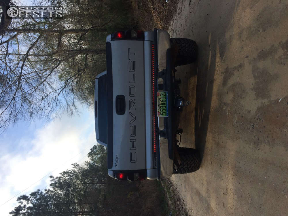 2004 Chevrolet Silverado 1500 with 20x9 Mayhem Arsenal and 33/12.5R20 ...