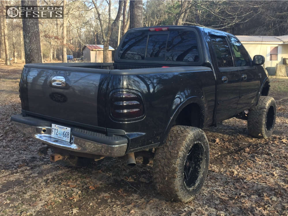 2003 Ford F-150 with 22x12 -44 Ballistic Rage and 37/13.5R22 Mark Ma ...