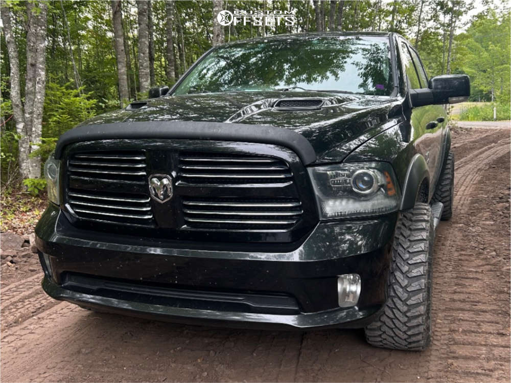 2014 Ram 1500 with 20x12 -44 Black Rhino Armory and 33/12.5R20 Venom ...