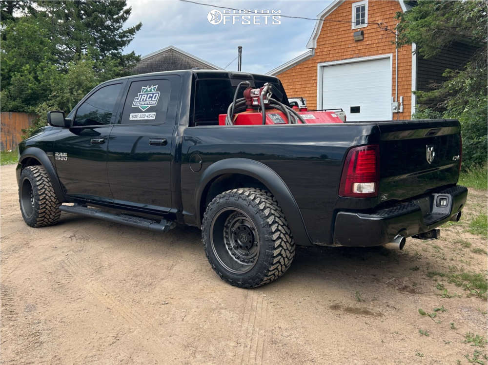 2014 Ram 1500 with 20x12 -44 Black Rhino Armory and 33/12.5R20 Venom ...