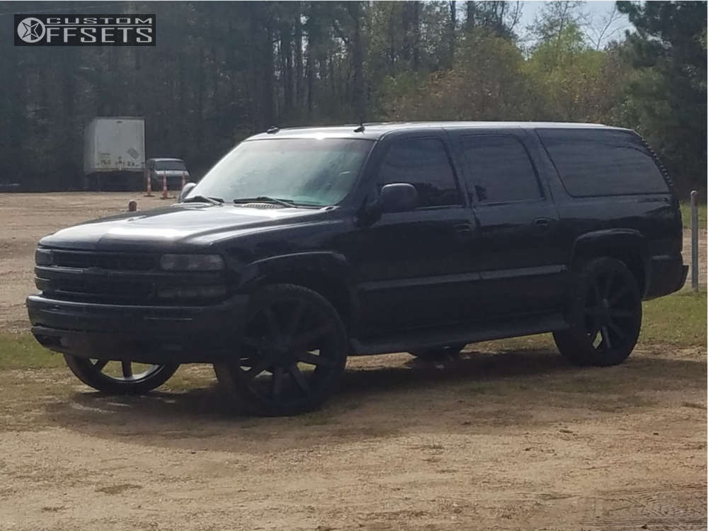 2003 Chevrolet Suburban with 26x10 28 KMC Slide and 305/30R26 Pirelli ...