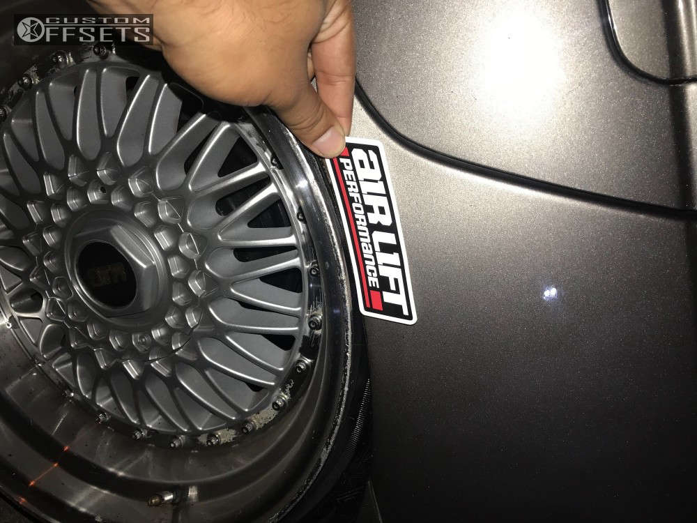 2005 Nissan Sentra with 17x8.5 30 STR 606 and 195/40R17 Continental All ...