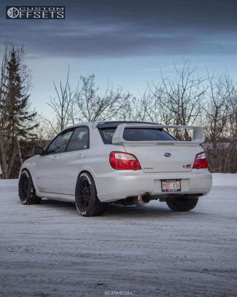 2007 Subaru WRX STI with 18x10 38 Enkei RPF1 and 265/35R18 Falken ...