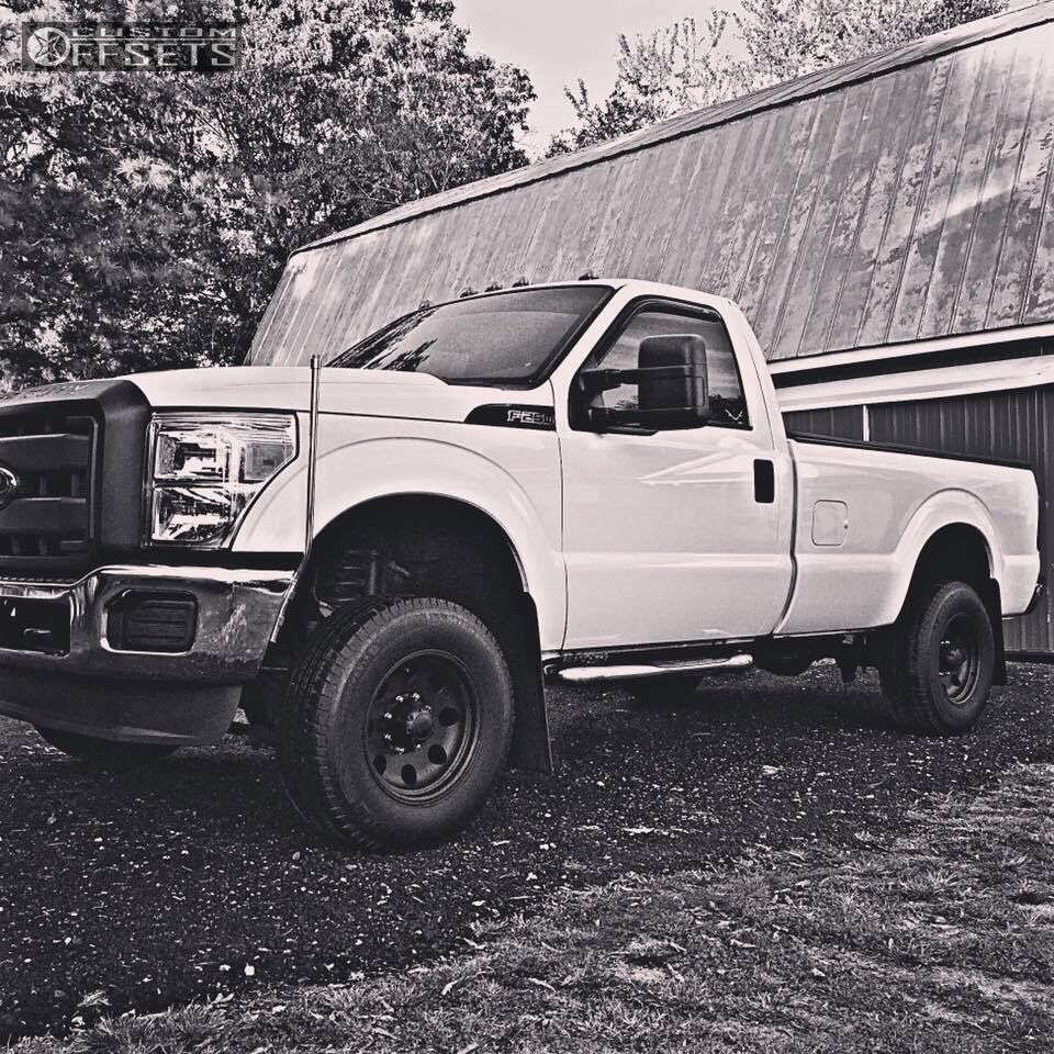 2014 Ford F-250 Super Duty with 17x9 -12 Ultra Type 164 and 265/70R17 ...