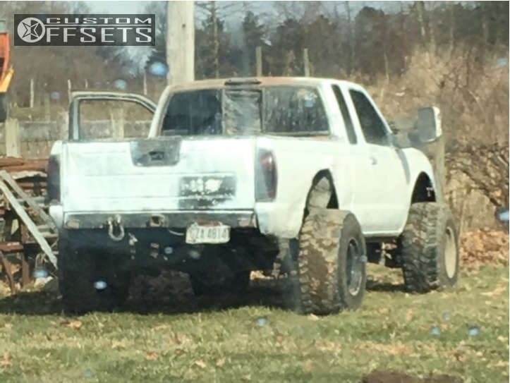 2001 Nissan Frontier with 15x12 -63 Bart Wheels Super Trucker and 33/12 ...