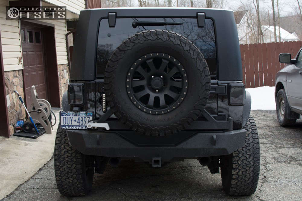 2014 Jeep Wrangler with 18x9 0 Pro Comp Series 36 and 35/12.5R18 ...