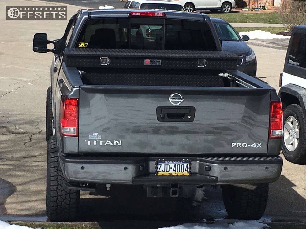 2015 Nissan Titan with 18x9 -12 Fuel Ripper and 305/65R18 Falken ...