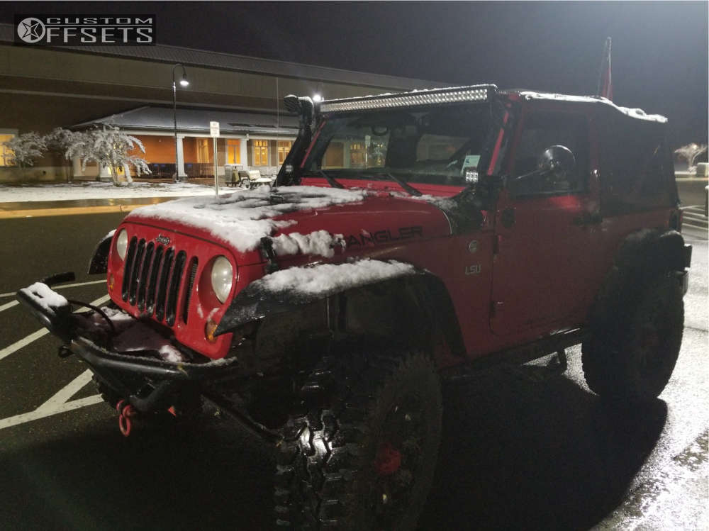 2011 Jeep Wrangler with 20x9 0 XD Misfit and 35/12.5R20 Firestone ...