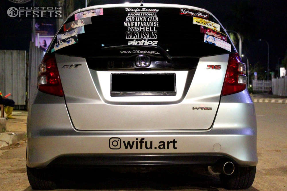 2008 Honda Fit with 16x7 38 Racing Hart and 195/50R16 Accelera Atr ...