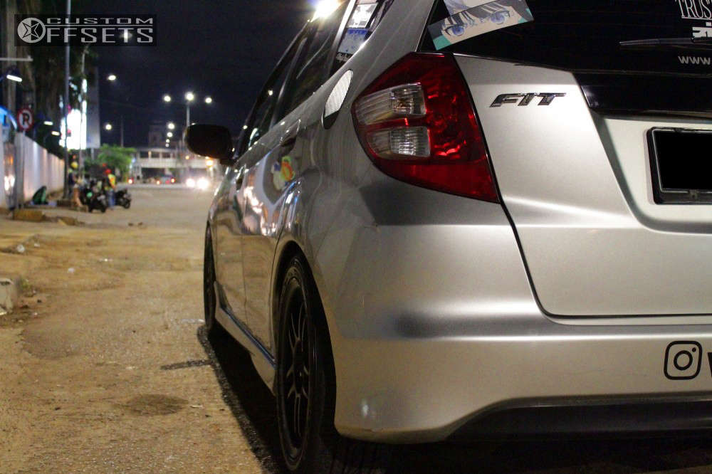 2008 Honda Fit with 16x7 38 Racing Hart and 195/50R16 Accelera Atr ...