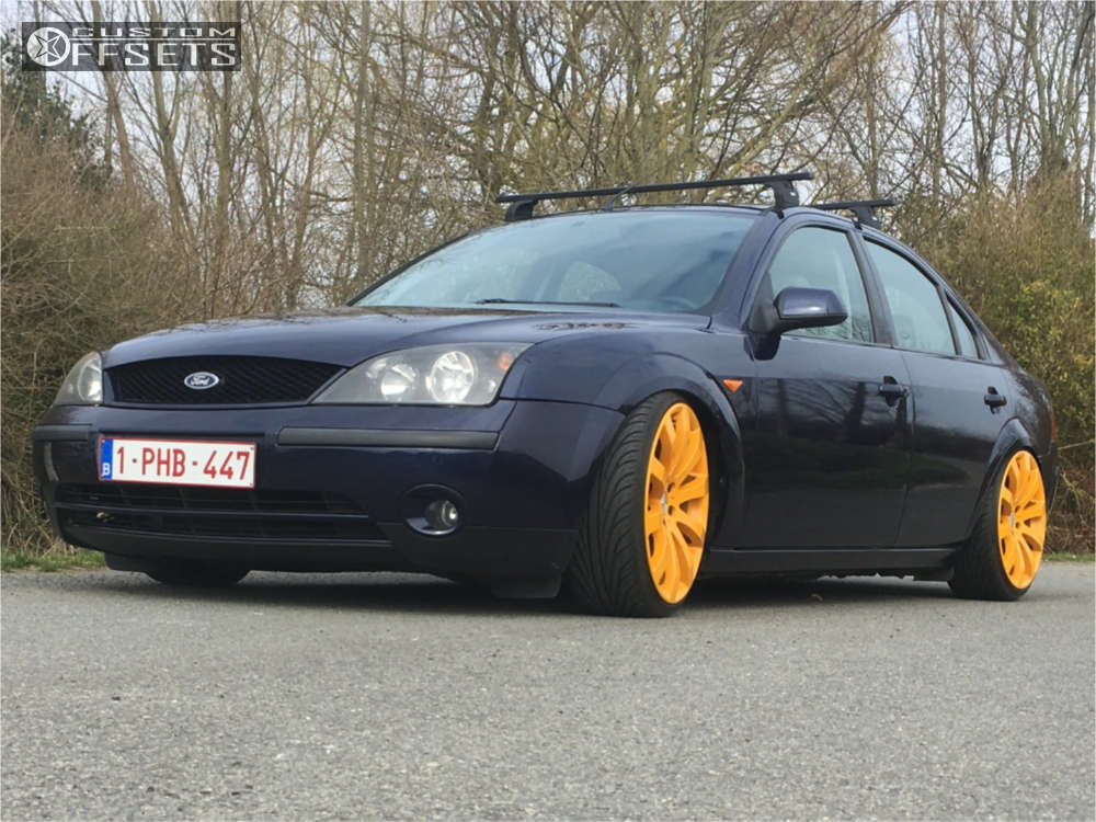 2001 Ford Fusion with 19x8.5 40 Tomason TN4 and 215/35R19 Nankang NS-20 ...