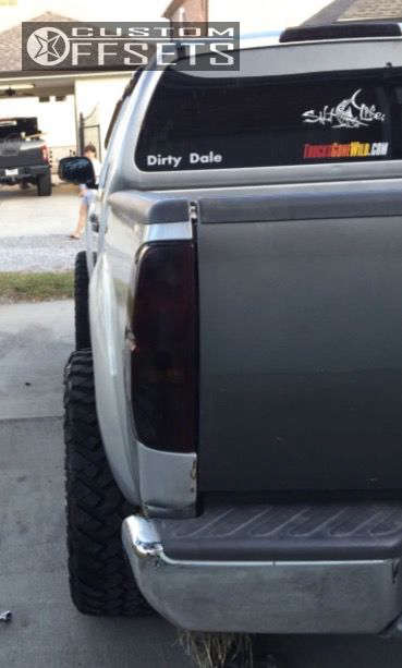 2006 Nissan Frontier with 20x10 -12 Fuel Hostage and 35/12.5R20 Nitto ...