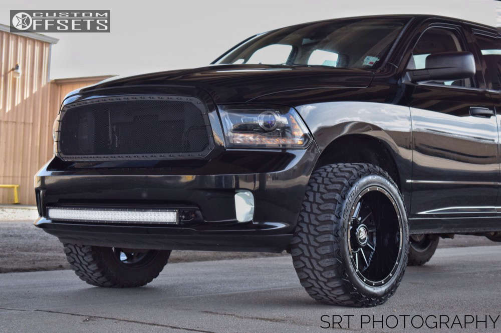 2014 Ram 1500 with 20x12 -44 American Truxx Striker and 33/12.5R20 Haida Mud Champ and Leveling ...