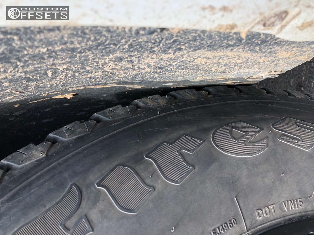 2006 GMC Sierra 1500 with 18x9 -12 Method Hole and 275/70R18 Firestone ...