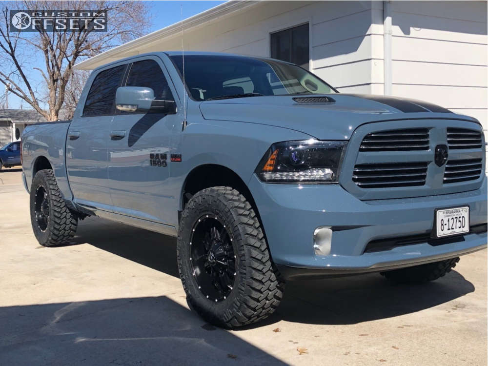 2015 Ram 1500 with 20x9 0 TIS 535B and 35/12.5R20 Nitto Trail Grappler ...