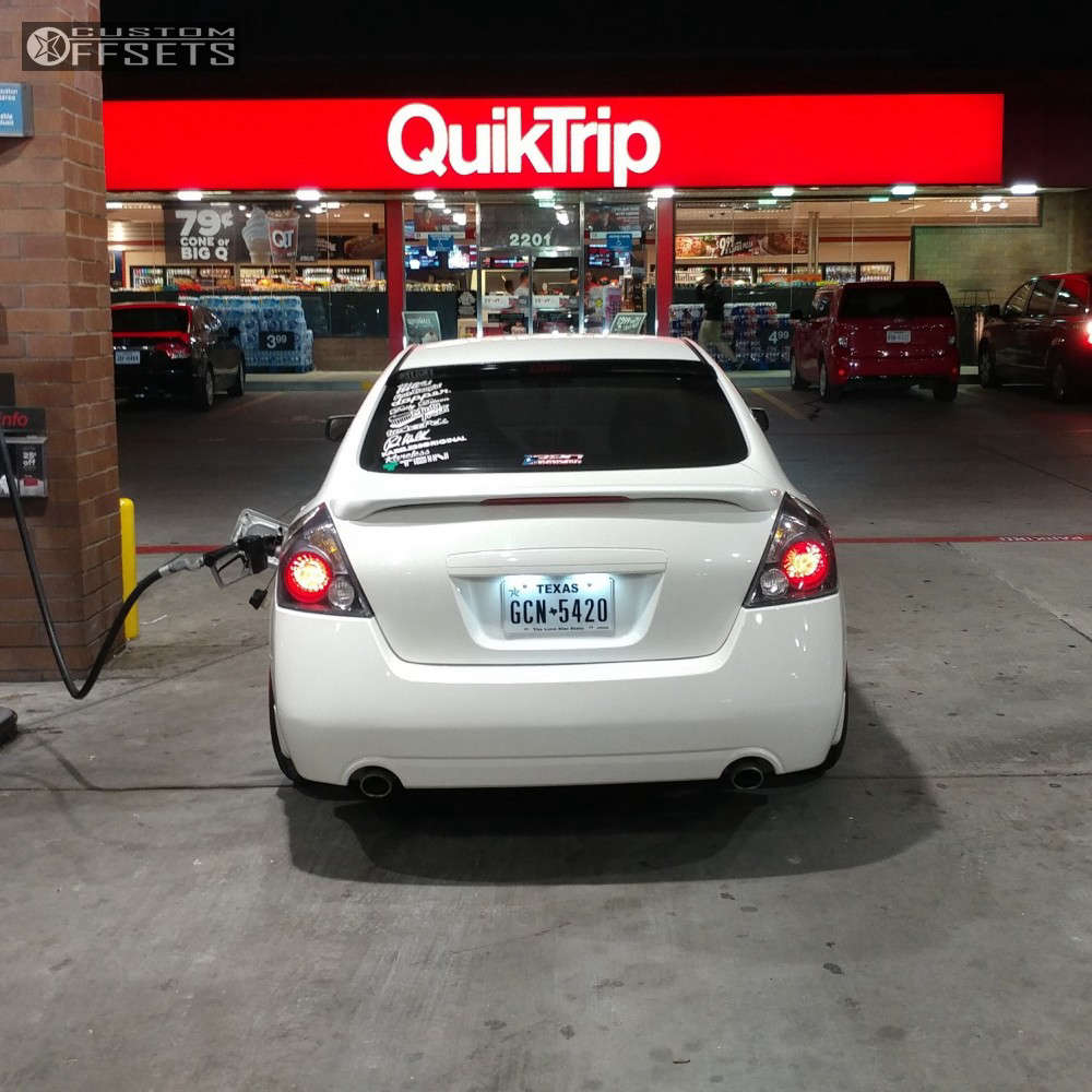 2009 Nissan Altima with 20x9.5 35 STR 607 and 255/30R20 Velozza and ...