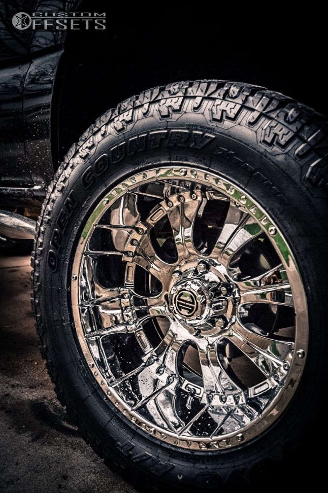 2005 Chevrolet Avalanche with 20x10 -25 MST 654 and 35/12.5R20 Toyo ...