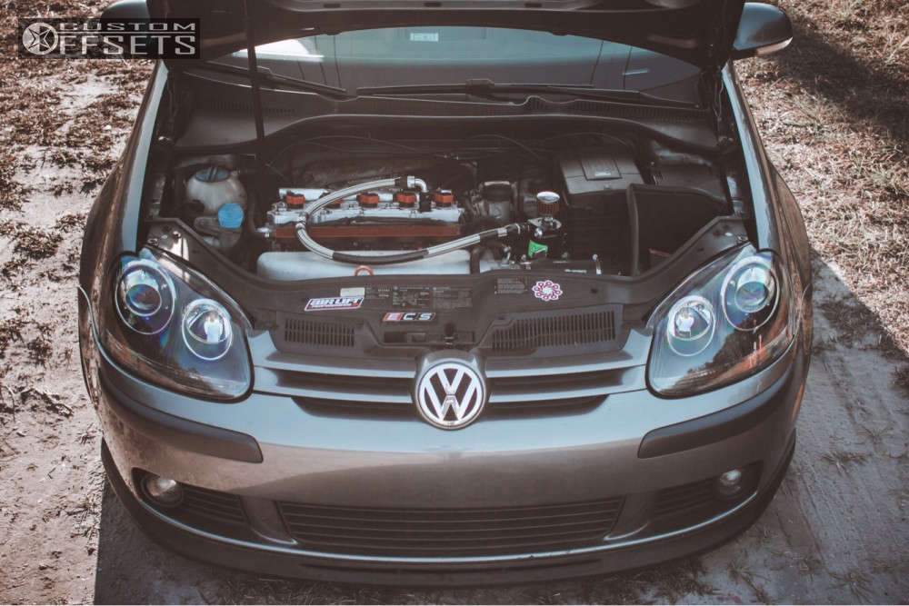 2007 Volkswagen Rabbit with 18x9 30 Fifteen52 Turbomac and 215/35R18 Nankang NS-20 and Air ...
